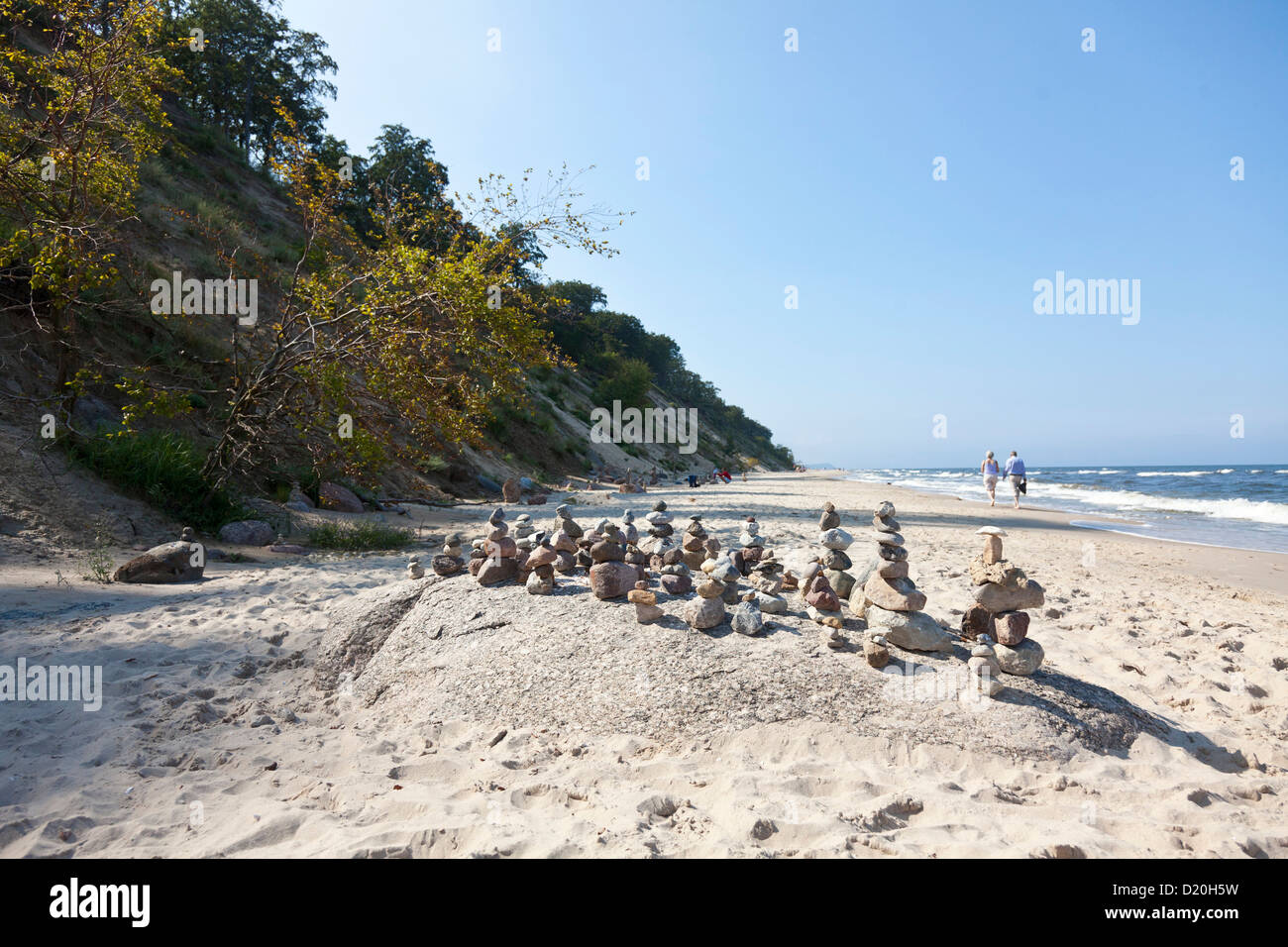 Row of stone men at the beach, cairns, cliff line, steep coast, bluffs ...