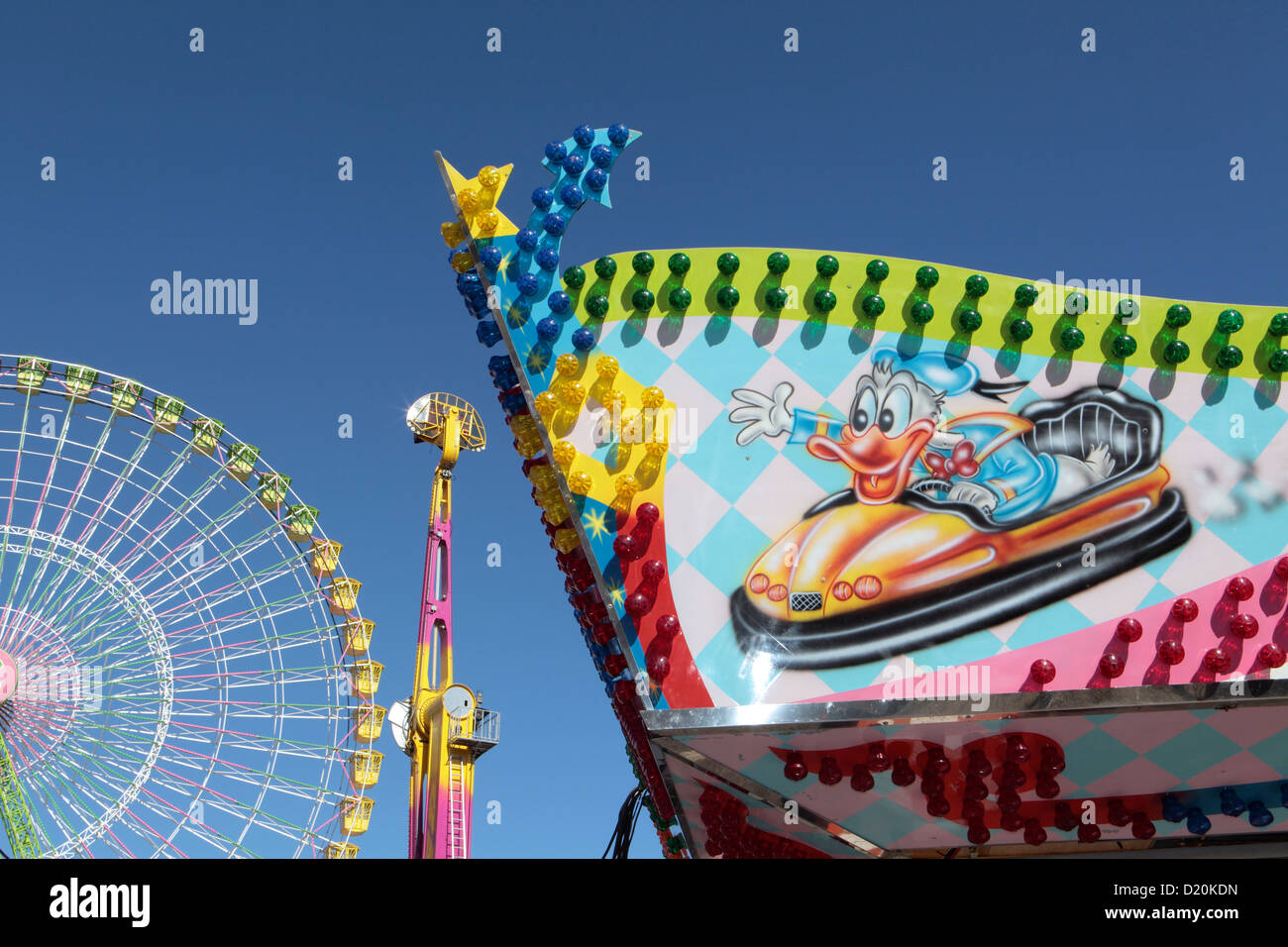 Fairground fun fair featuring dodgem car and ferris big wheel, Puerto ...