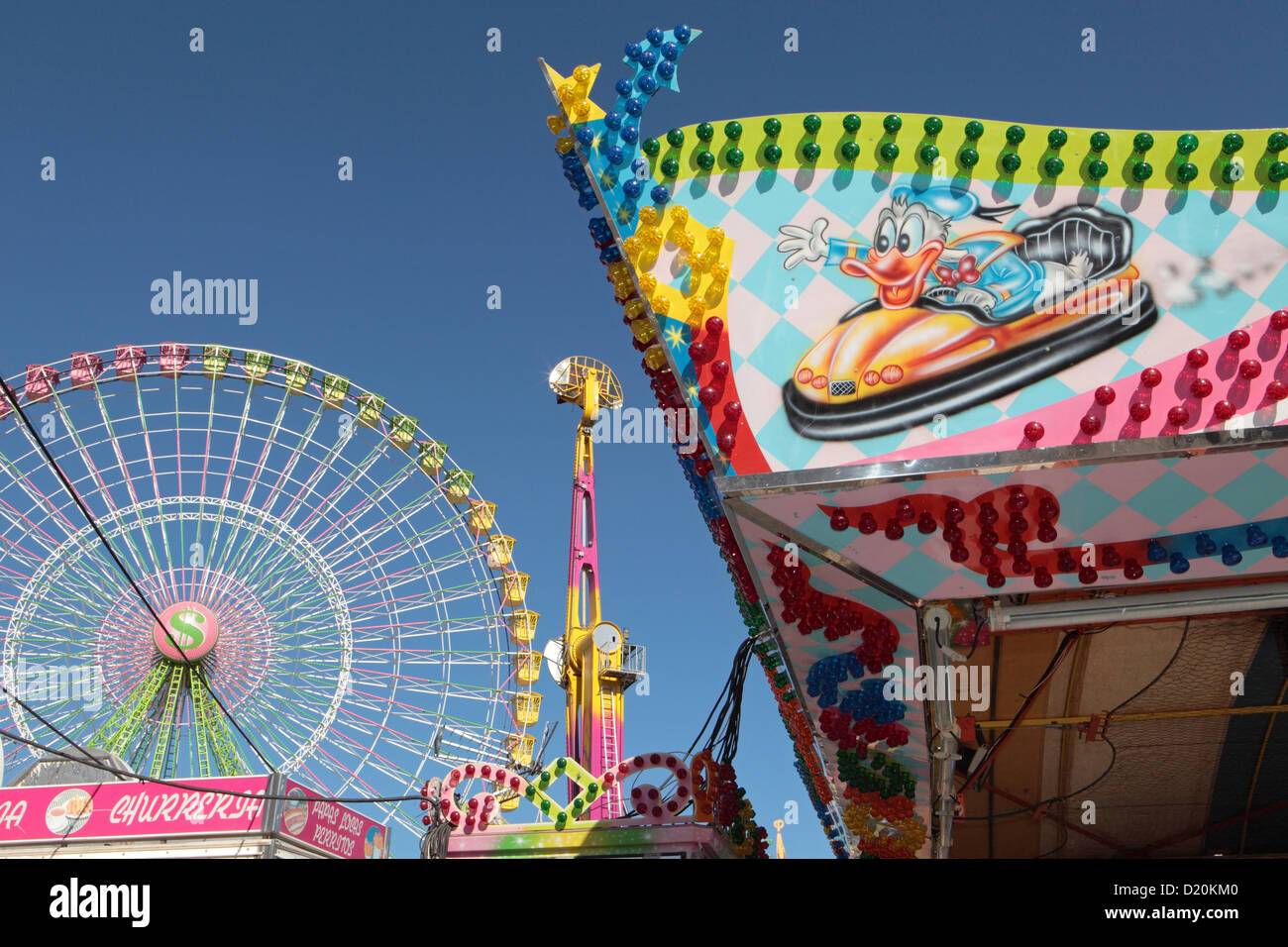Fairground fun fair featuring dodgem car and ferris big wheel, Puerto ...