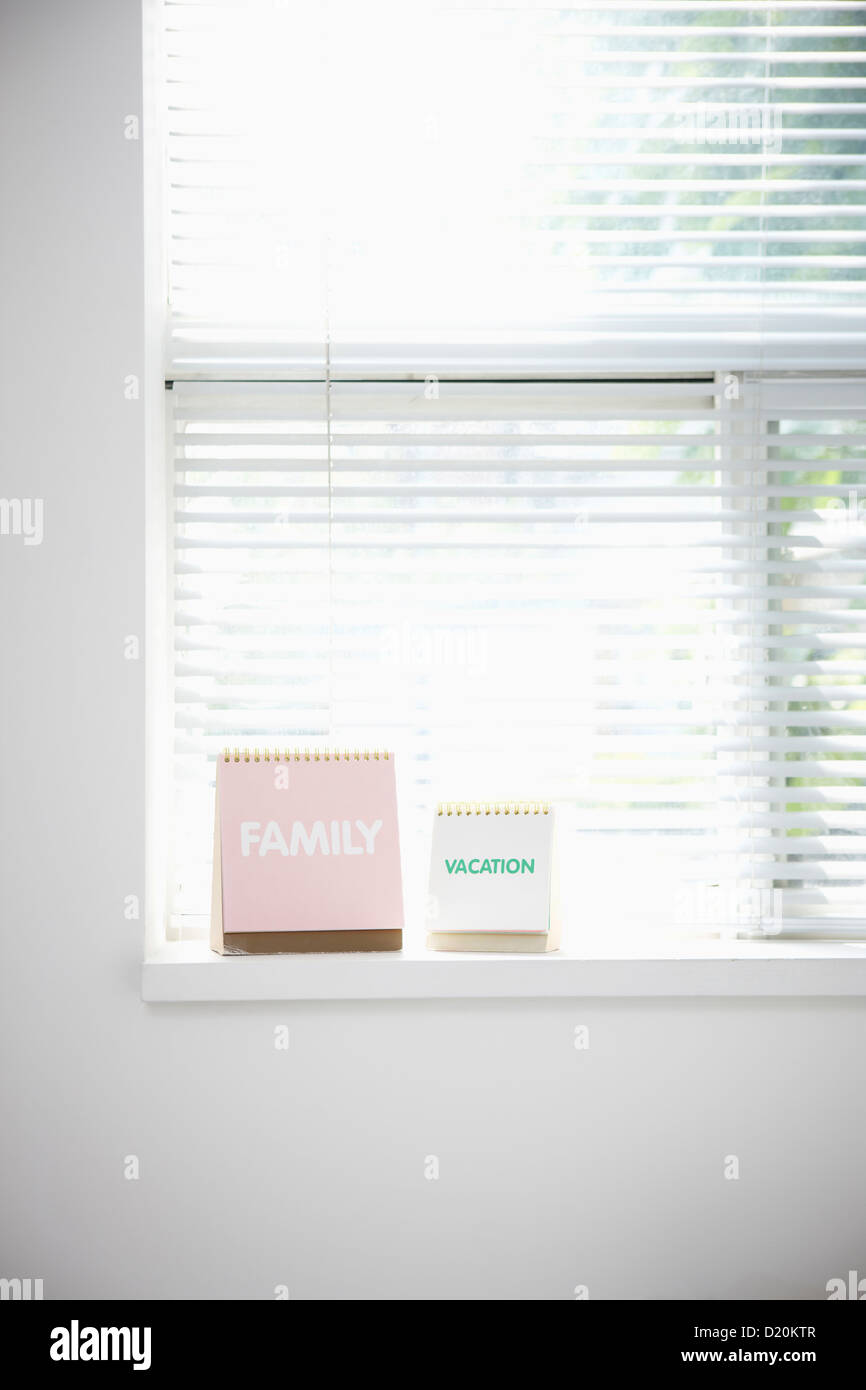 calendars on the window Stock Photo - Alamy