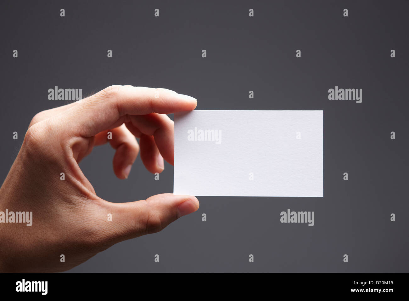 a piece of paper in hand Stock Photo - Alamy