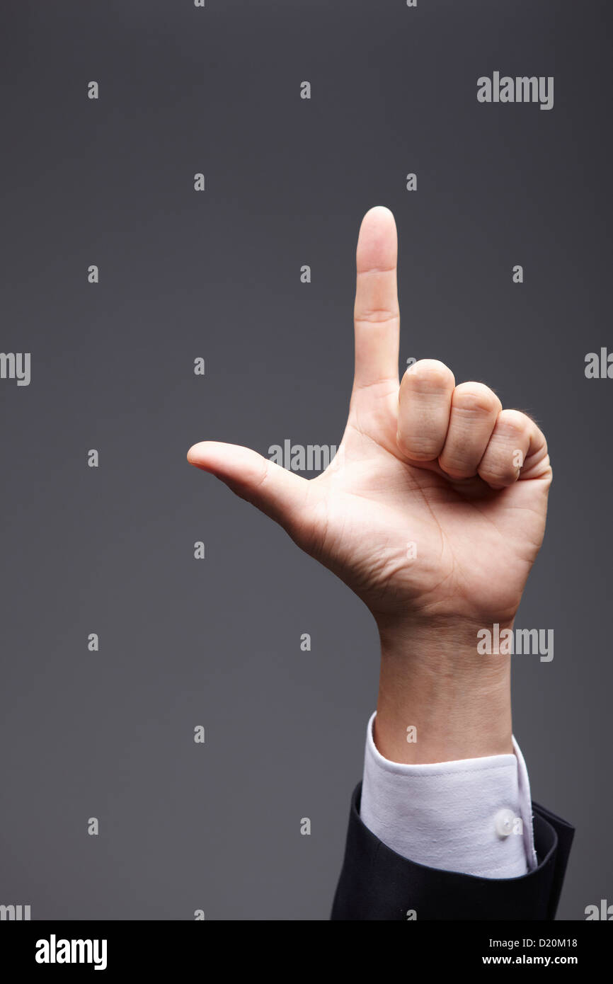 hand signal of scissors Stock Photo - Alamy