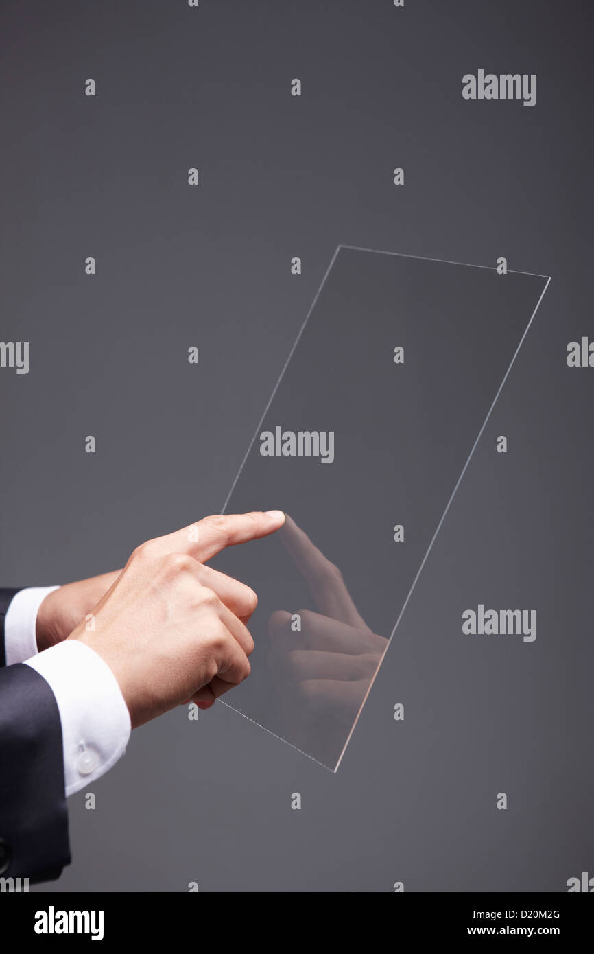 Man touching piece glass hi-res stock photography and images - Alamy