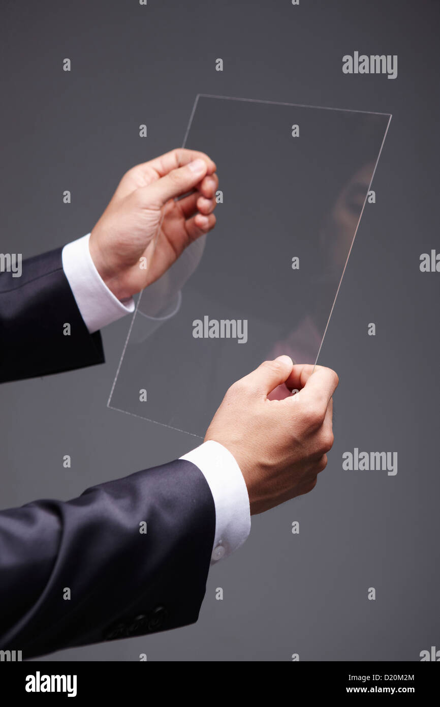 Man touching piece glass hi-res stock photography and images - Alamy