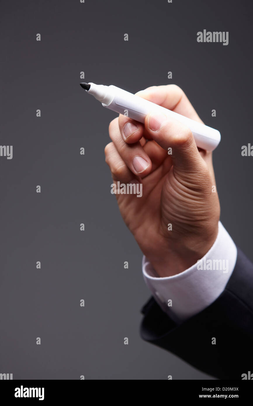 man grabbing a pen Stock Photo - Alamy