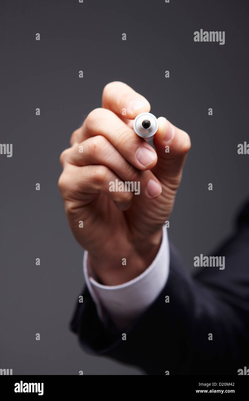 man grabbing a pen Stock Photo - Alamy