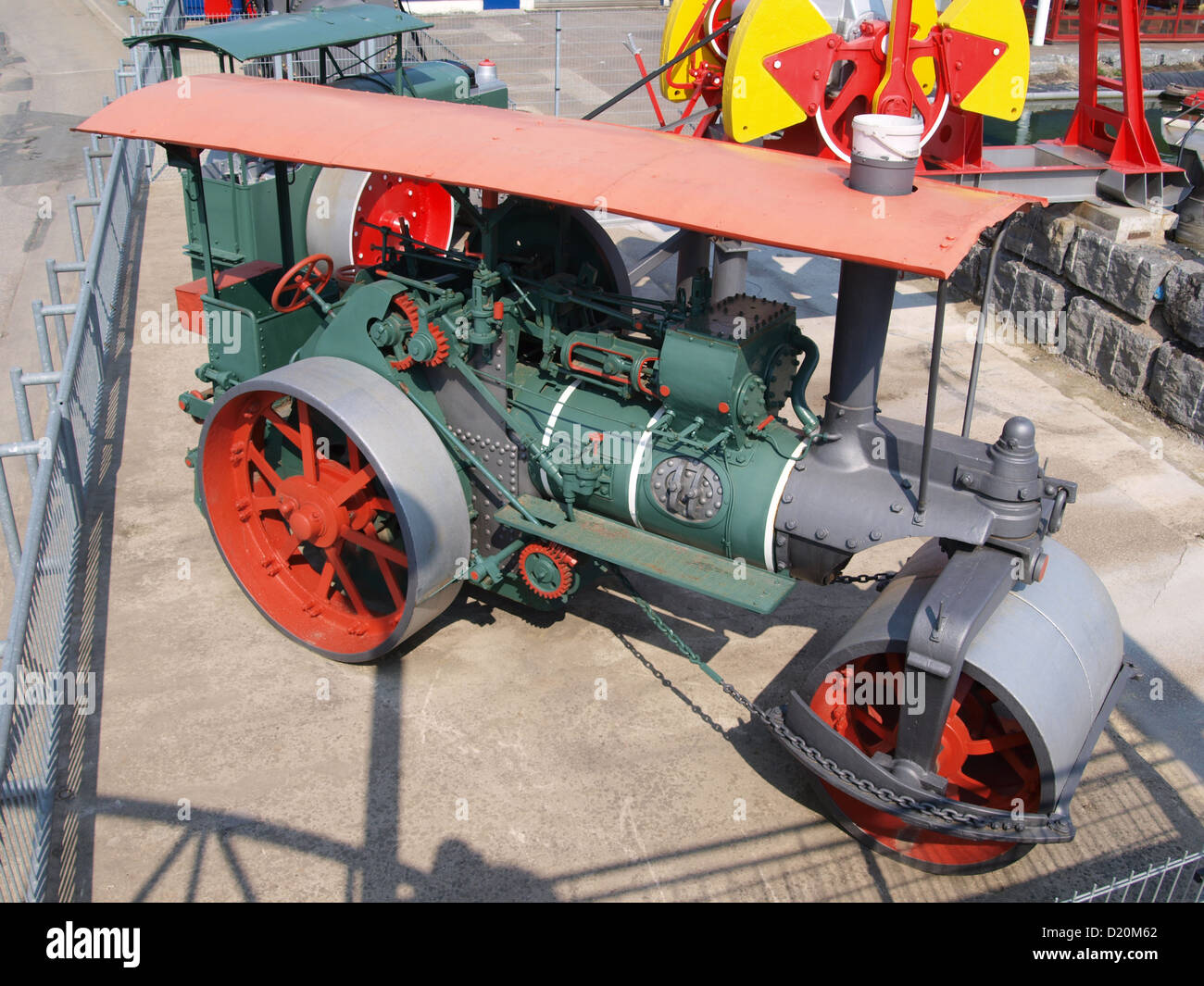 The old steam-powered roller is a historical construction vehicle used ...
