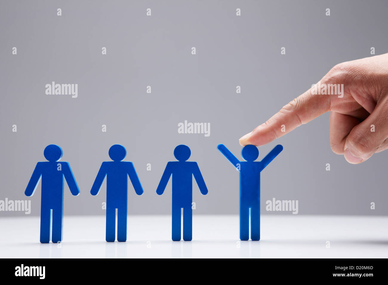man pointing out a figure of person Stock Photo - Alamy