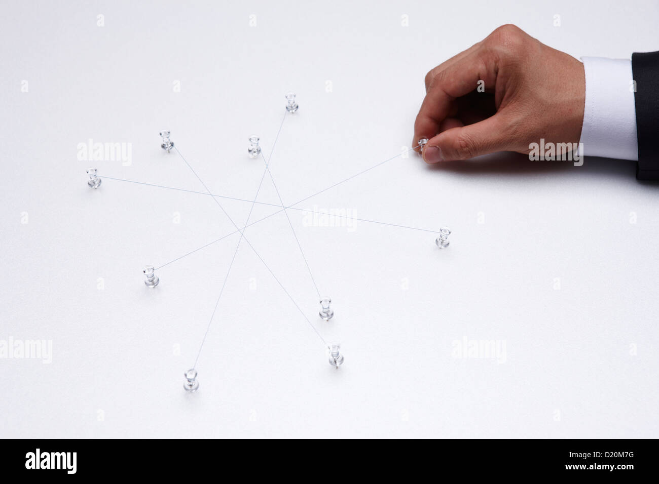 man tacking on the paper Stock Photo - Alamy