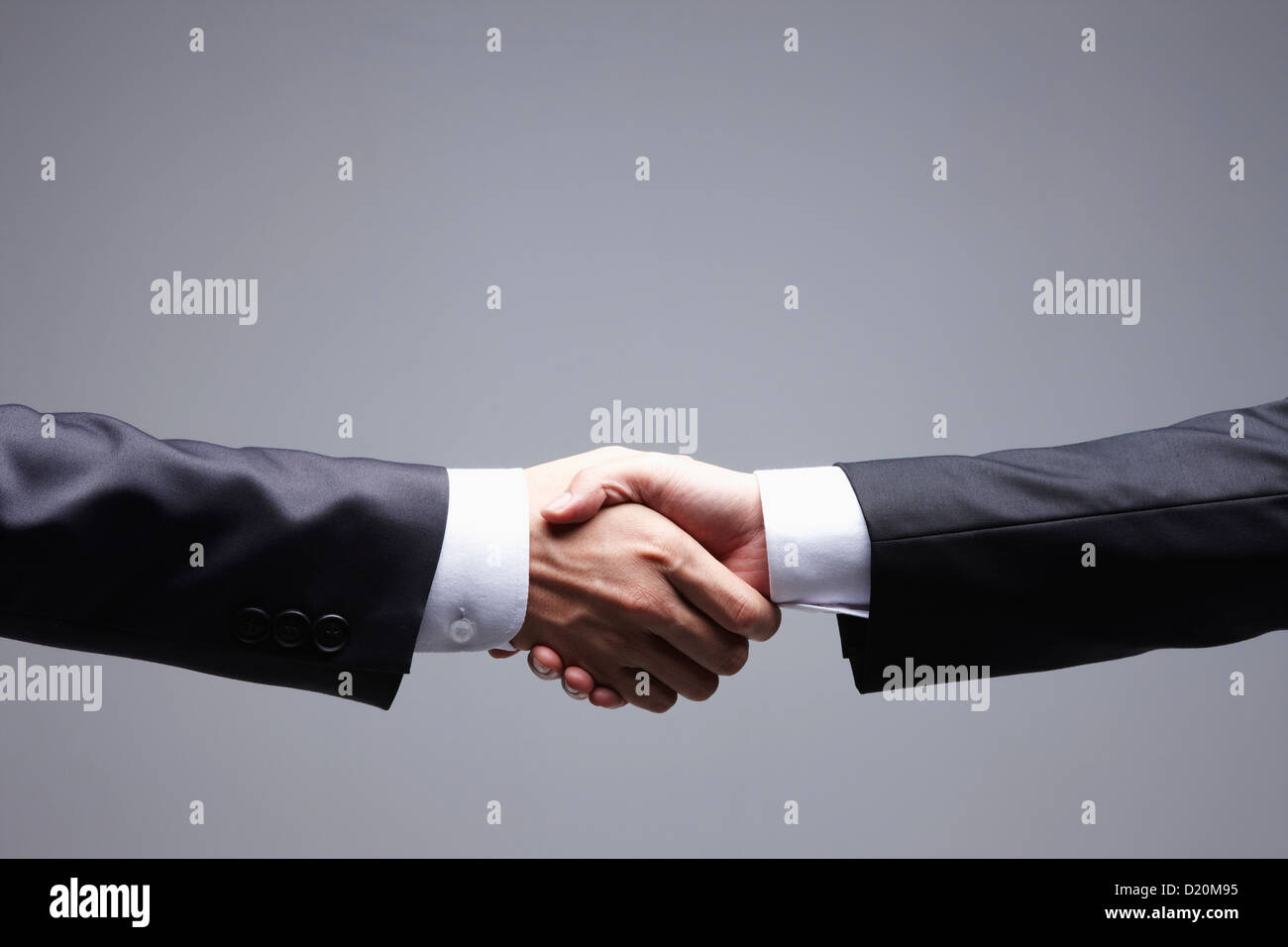 two hands held tightly each other Stock Photo - Alamy