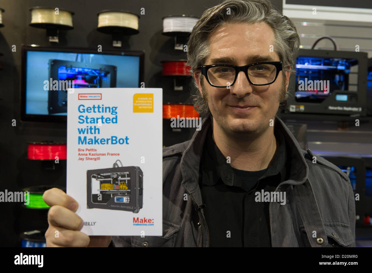 Las Vegas, US - 2013-01-08. Bre Pettis, Co-Founder and CEO of MakerBot Industries, hold up his ...