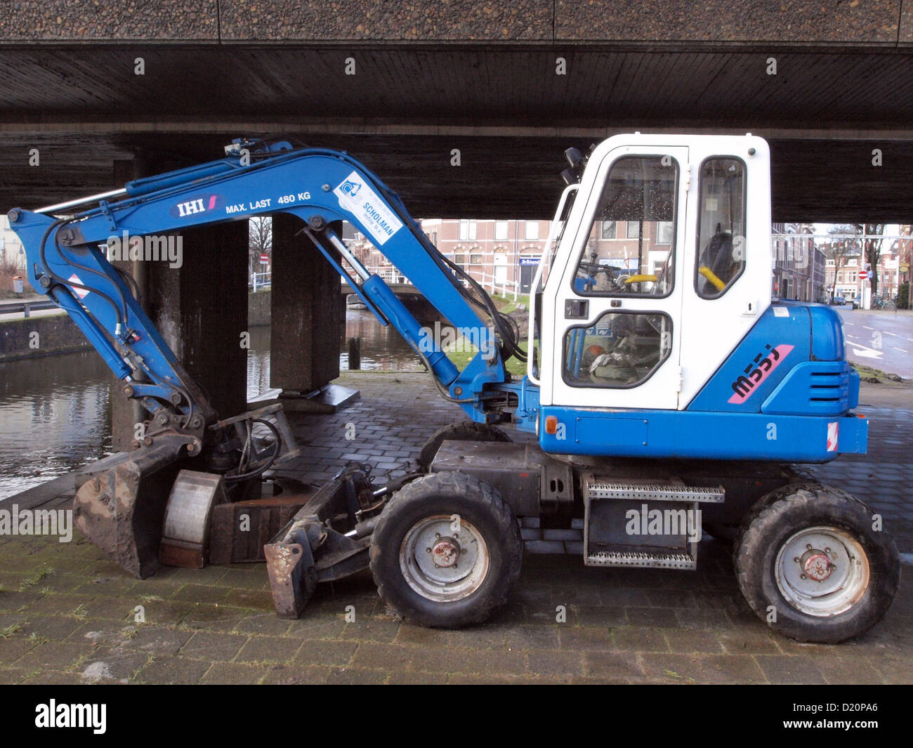 The M55J is a heavy-duty excavator used in construction and excavation ...