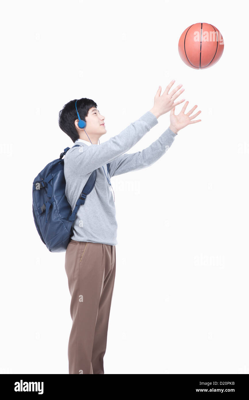 Male student headphones throwing hi-res stock photography and images ...