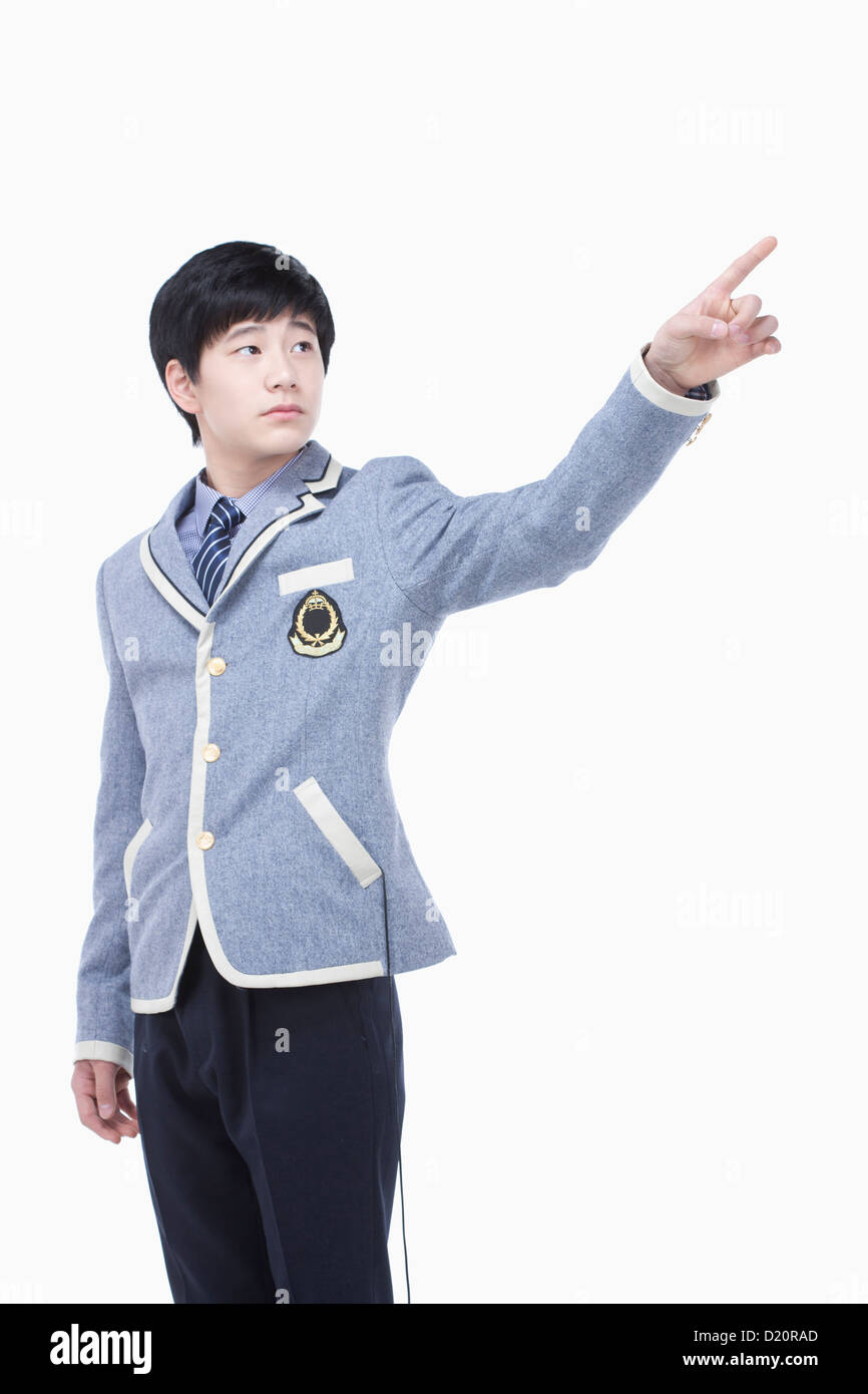 a male student pointing behind Stock Photo - Alamy