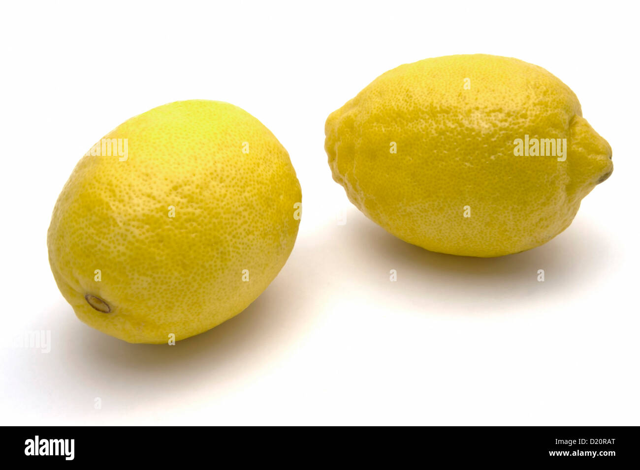 Two fresh lemons closeup on white background Stock Photo - Alamy