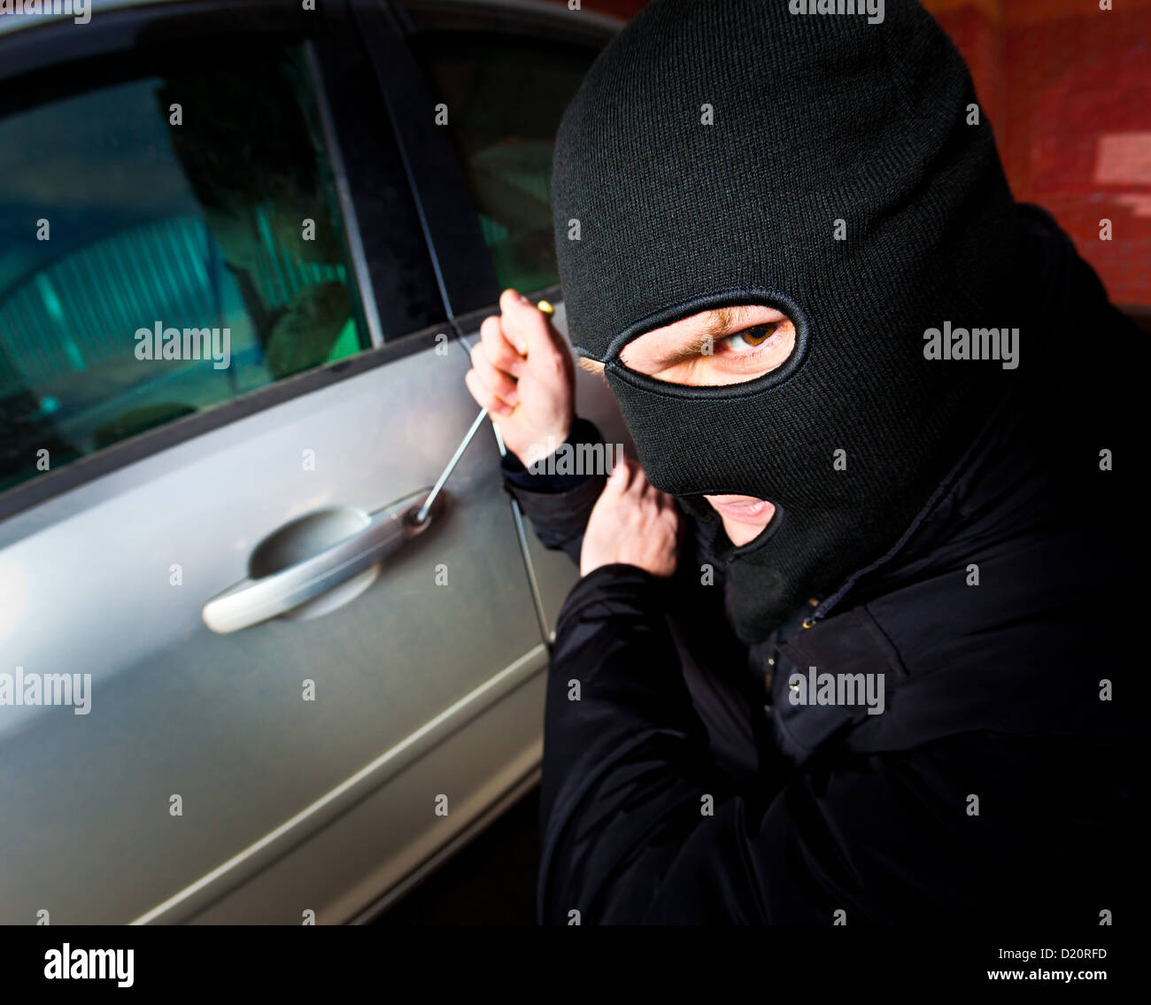 robber and the thief hijacks the car Stock Photo - Alamy