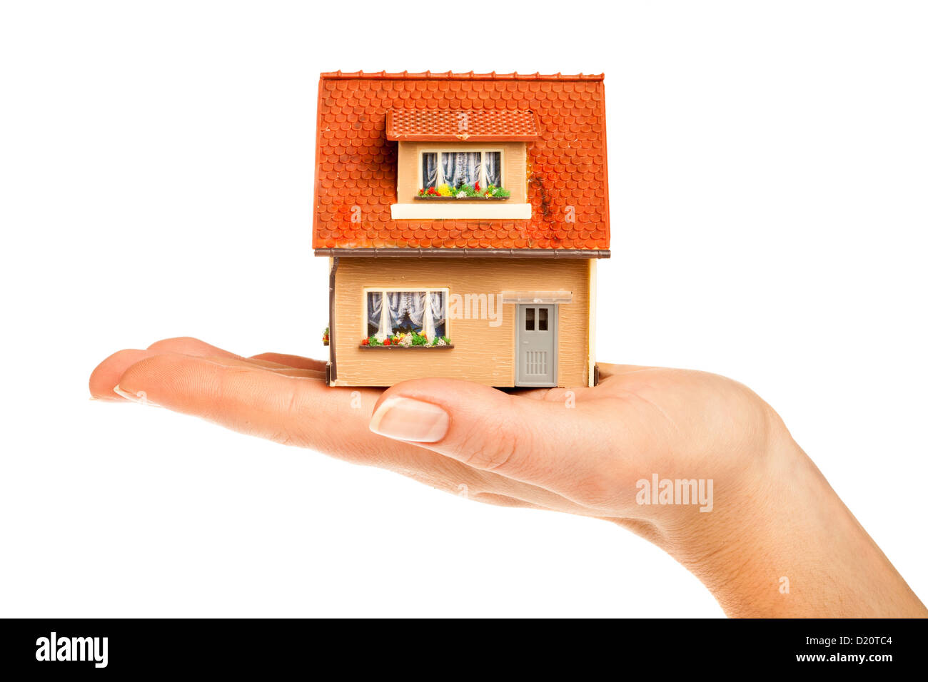 house in human hands on a white background Stock Photo - Alamy