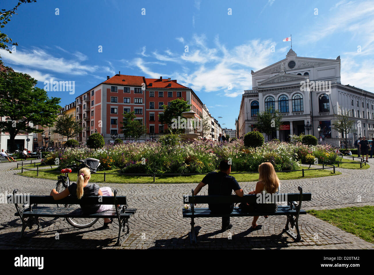People in front of the Staatstheater at the square Gaertnerplatz ...