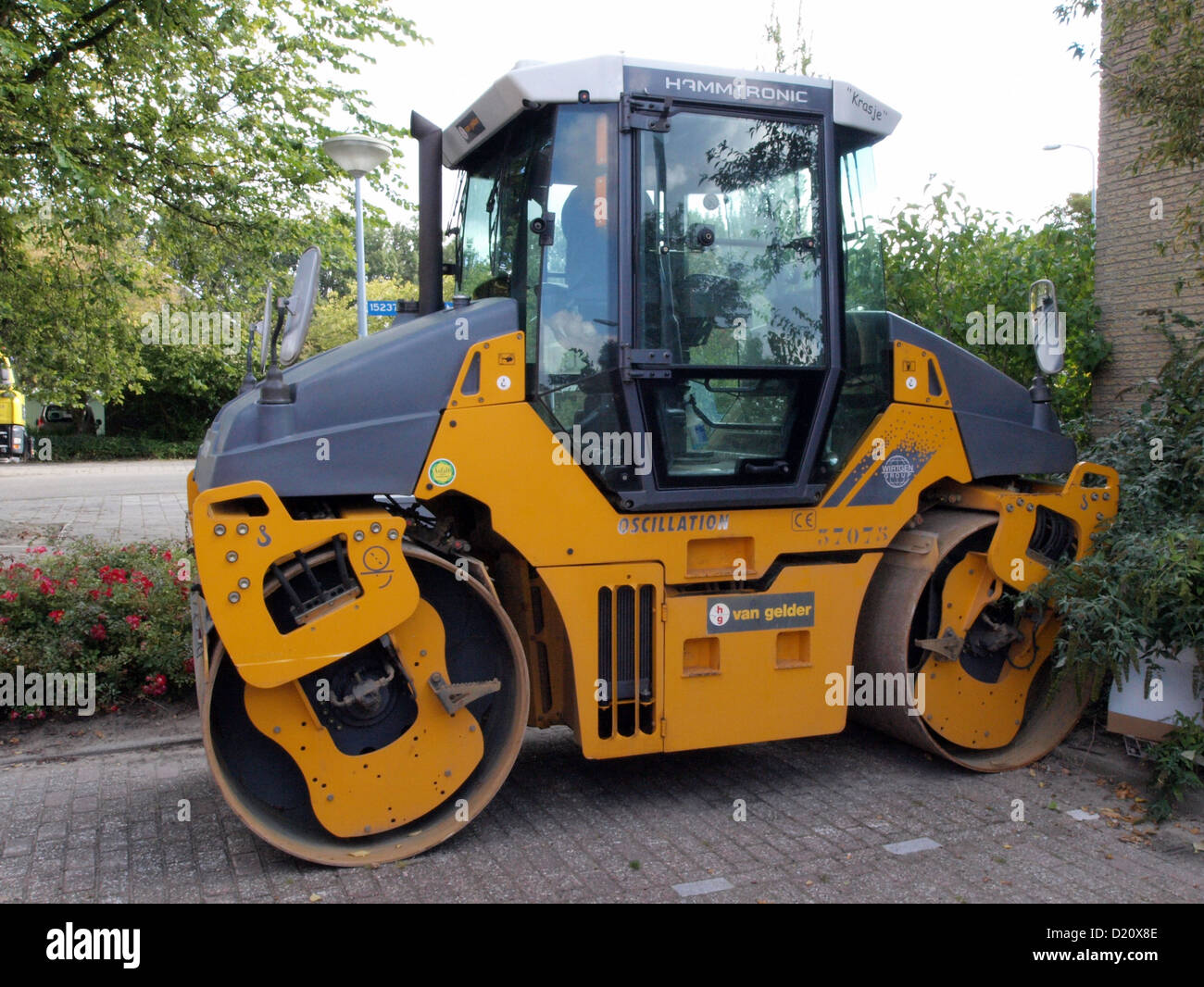 The Hamm road roller is a heavy-duty construction vehicle used in roadwork and infrastructure ...