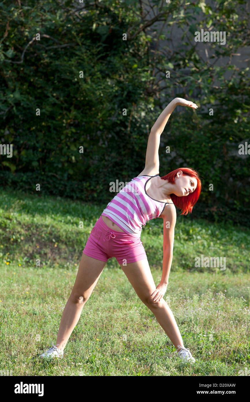 woman does gymnastics outdoors Stock Photo - Alamy