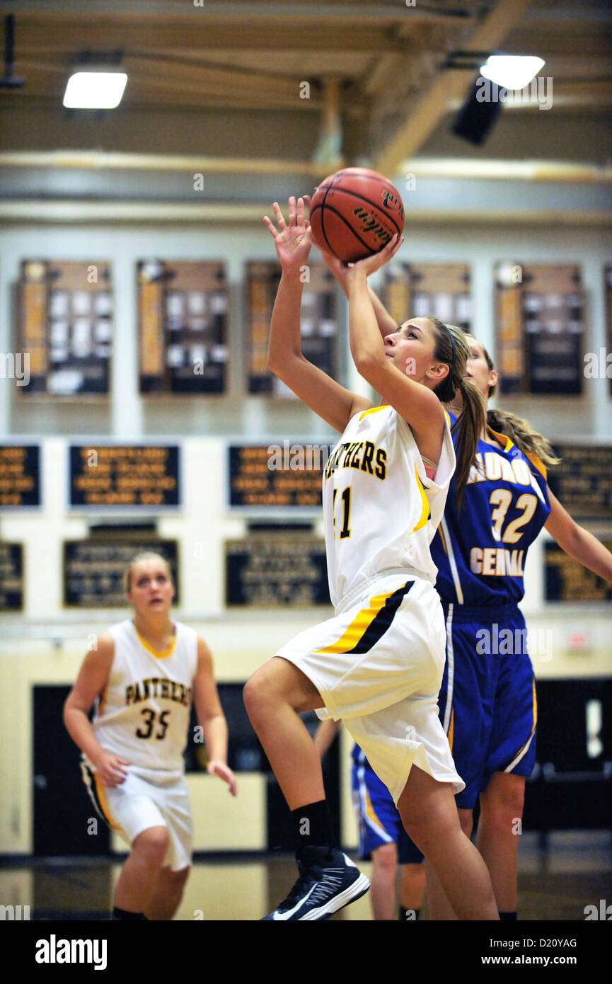 Sport Basketball Female players drive along the baseline ends with a ...
