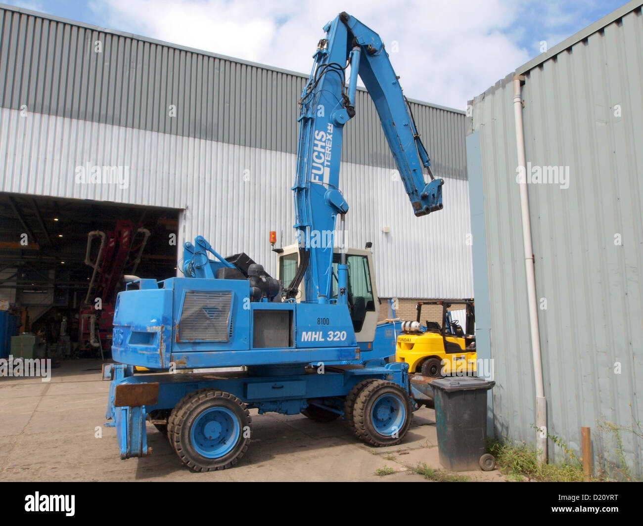The Terex Fuchs MHL 320 is a materials handler used in construction and ...