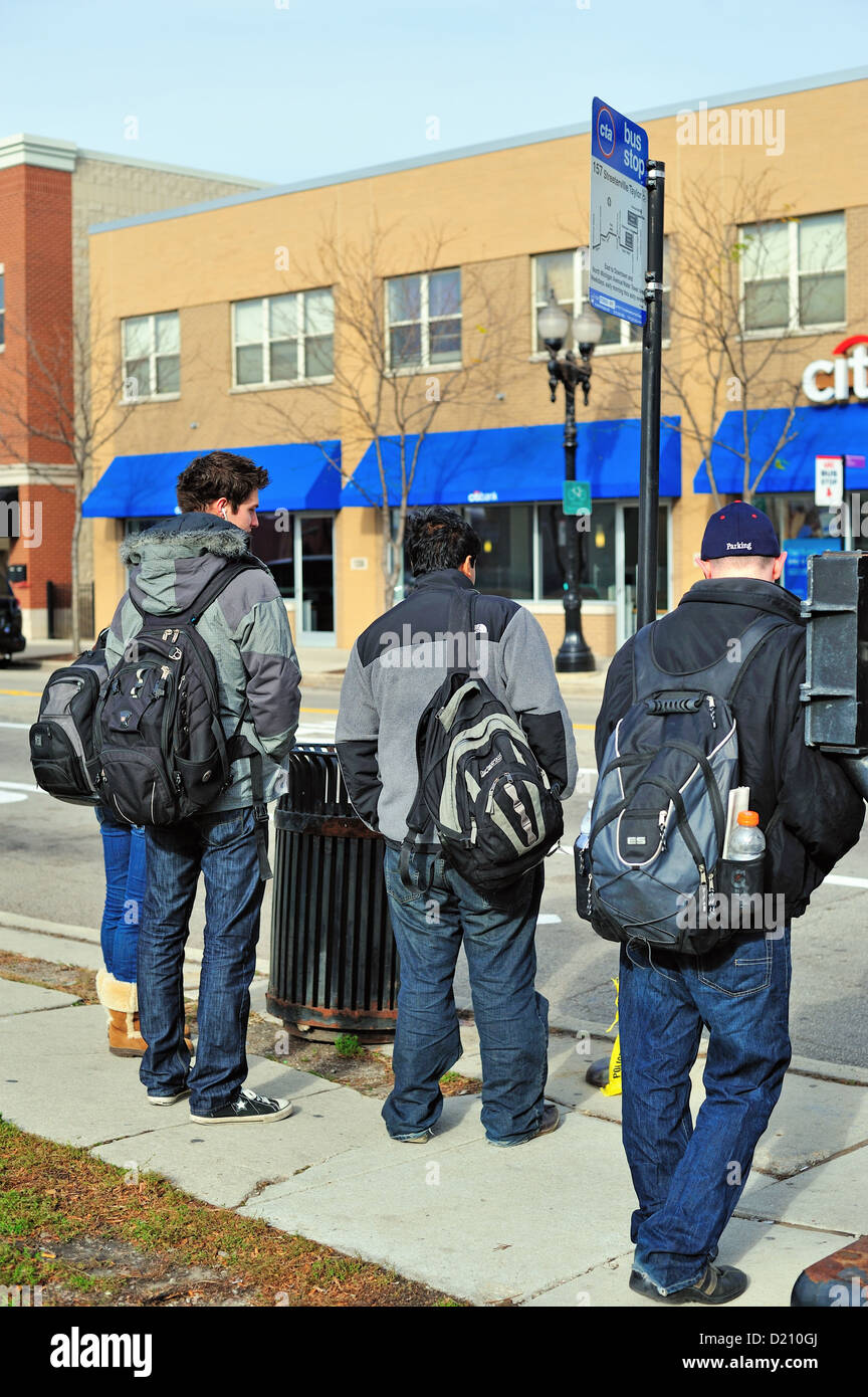 Students wait public bus transportation hi-res stock photography and ...