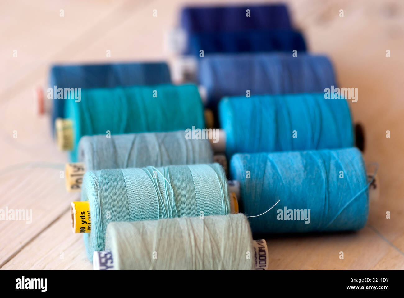 a still life image of reels of cotton thread Stock Photo - Alamy