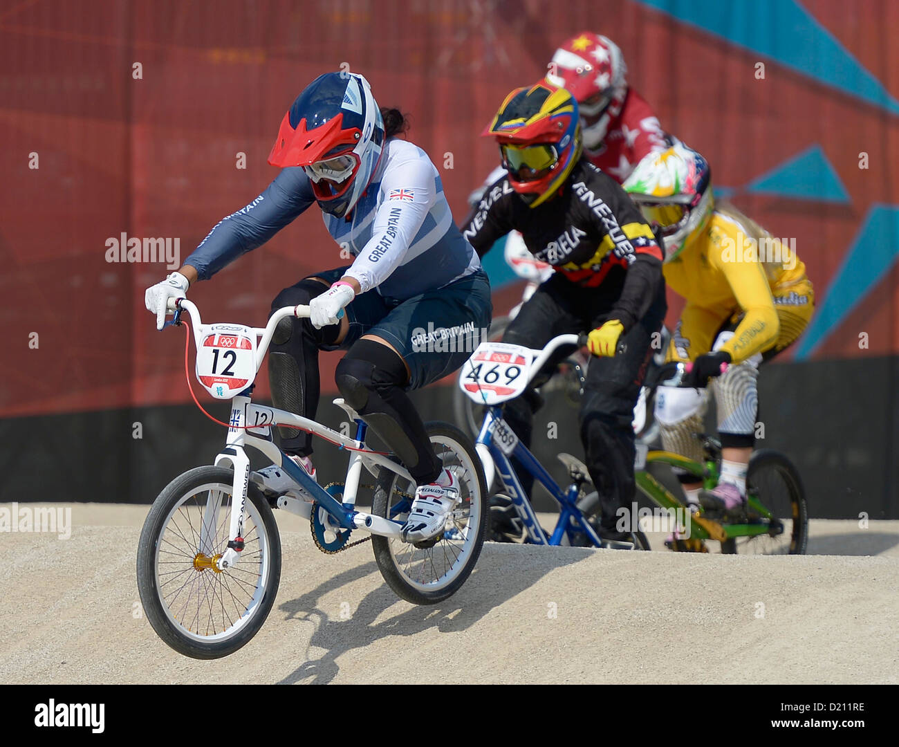 Britain's Shanaze Reade leads from Venezuela's Stefany Hernandez. BMX ...