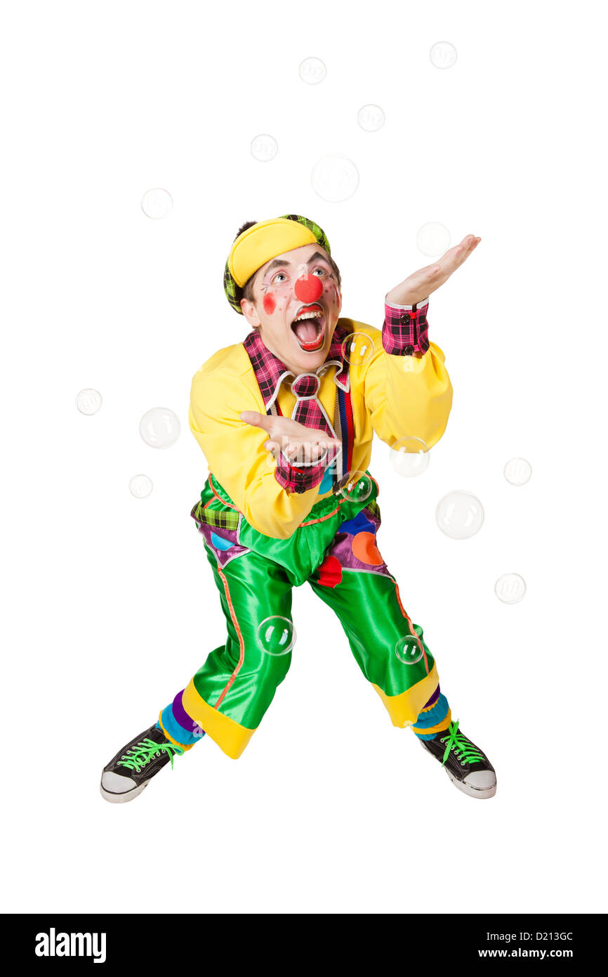 Cheerful clown in the soap bubbles isolated on a white background Stock ...