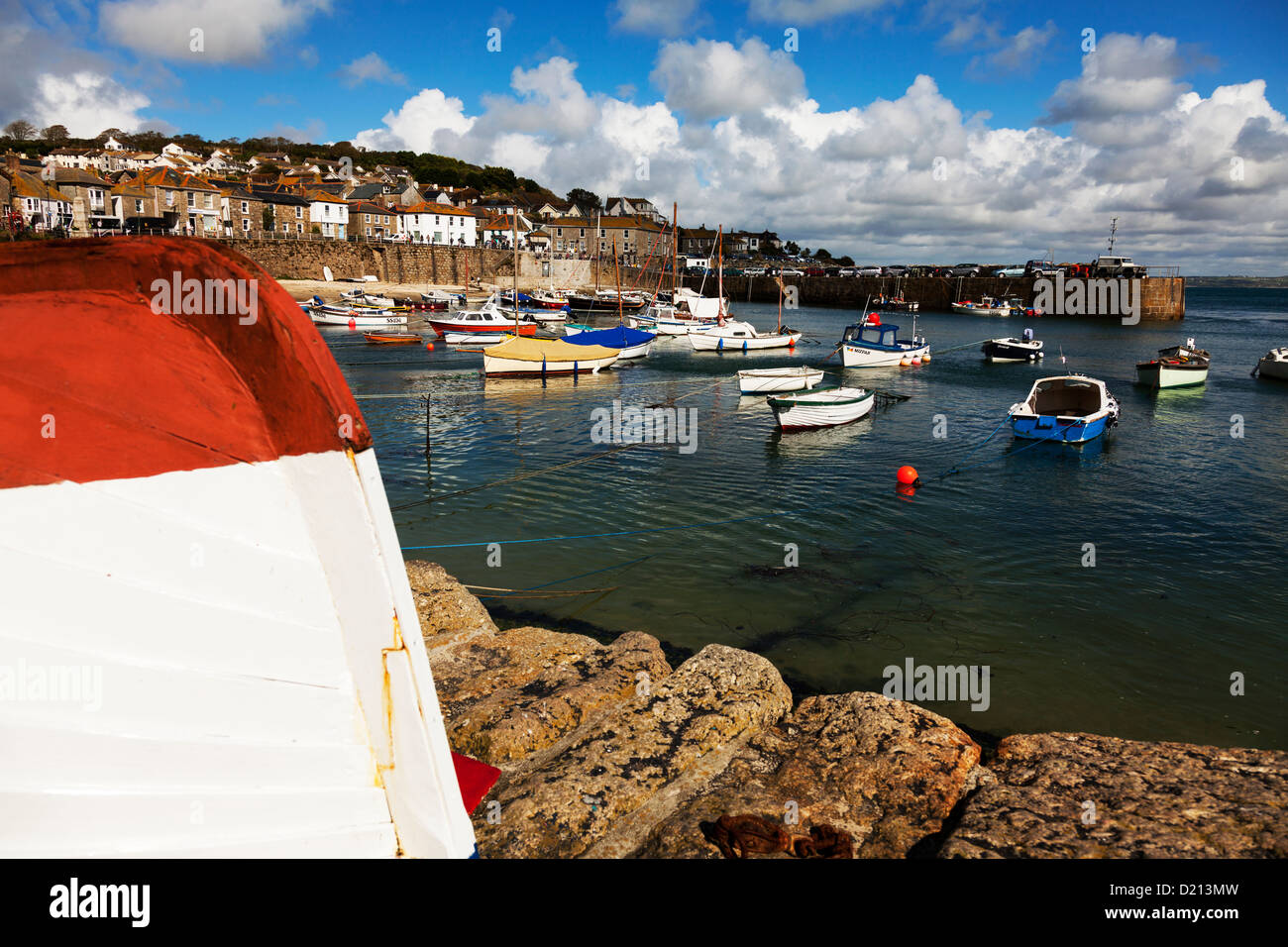 Mousehole harbor harbour Cornwall small fishing boats moored with ...