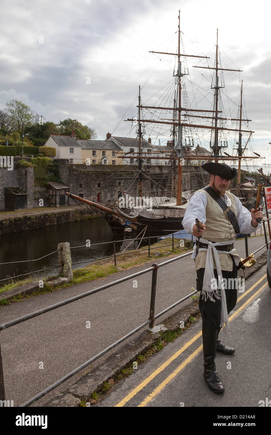swashbuckler with pistol Tall ships in harbour, harbor at Charlestown ...
