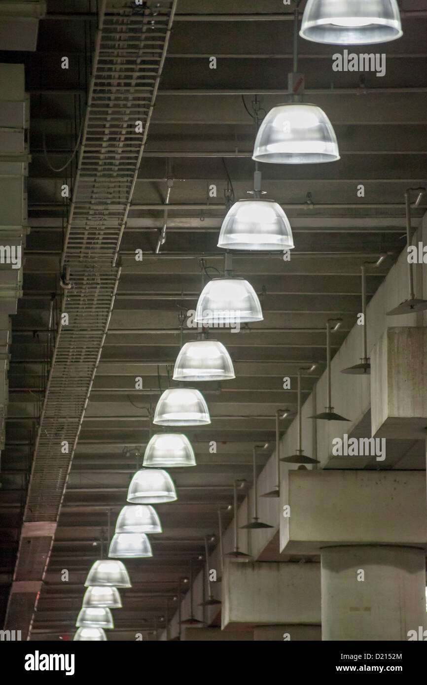 Overhead lights in a parking garage Stock Photo - Alamy
