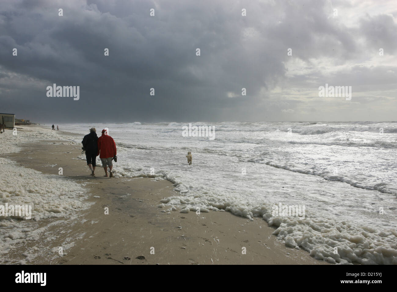 People walking along a stormy beach, Sylt, North Sea Coast, Schleswig ...
