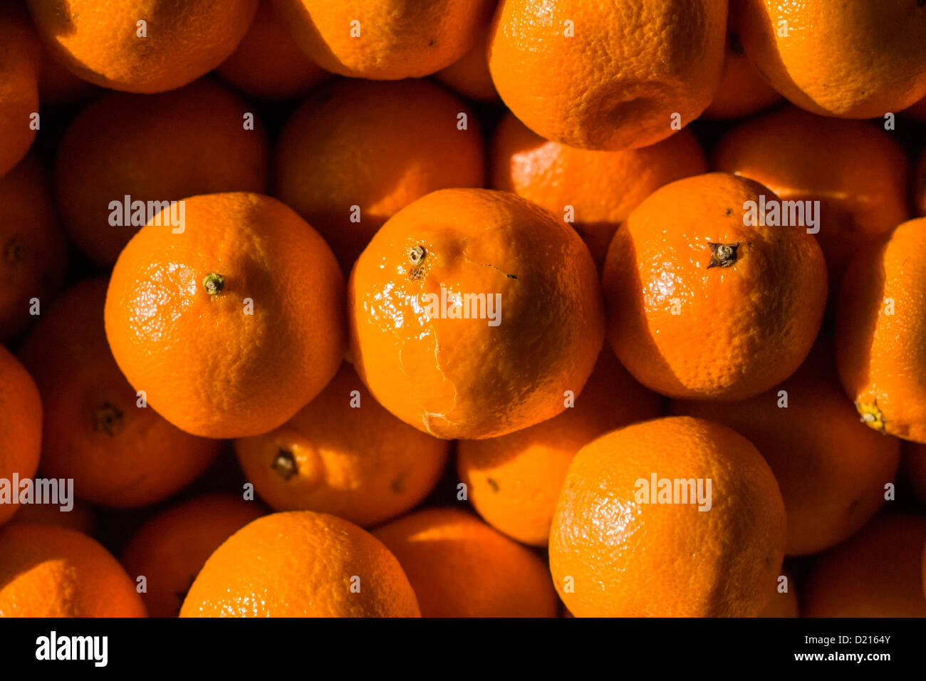 A Bushel Of Oranges Stock Photo - Alamy