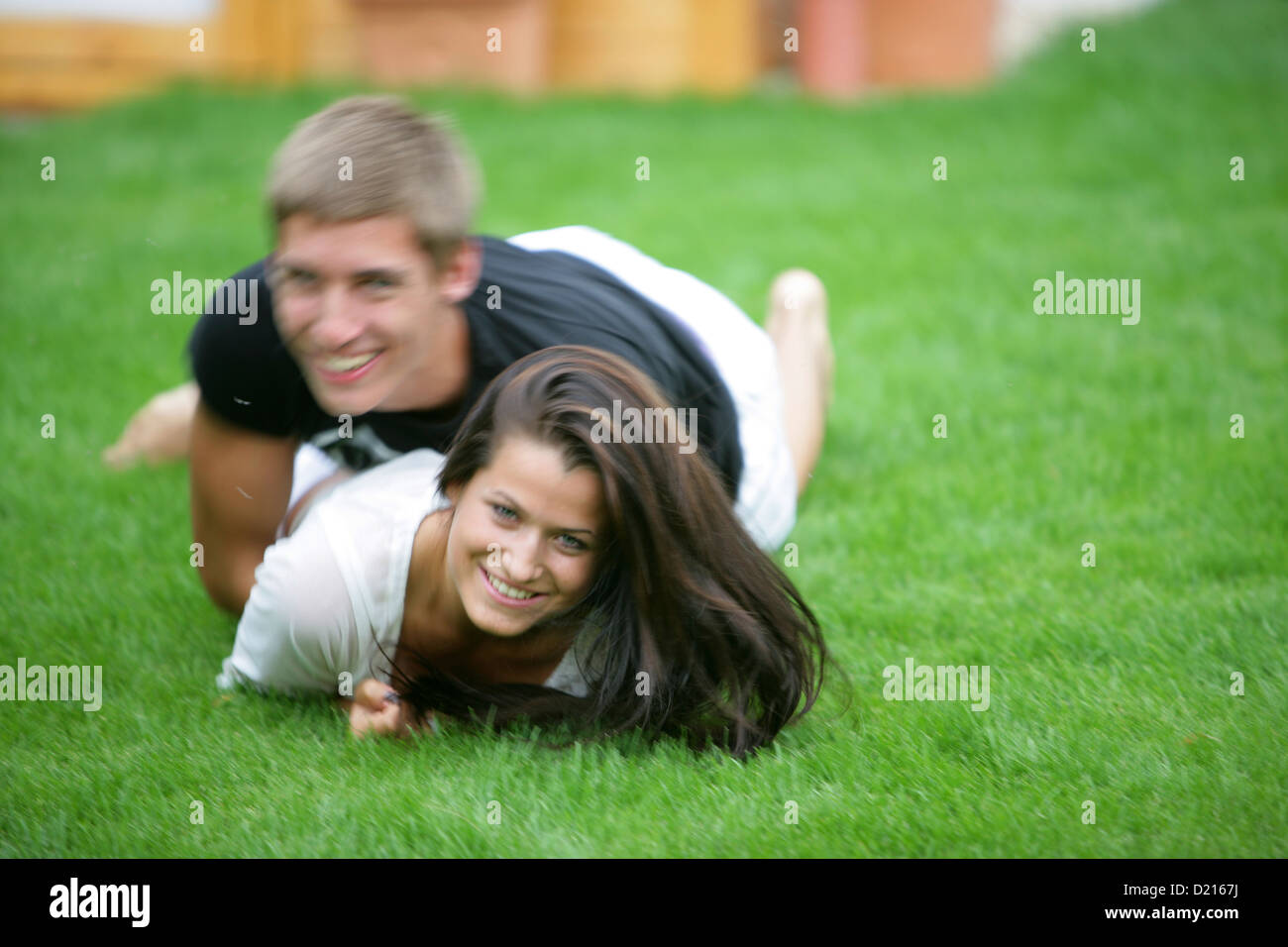 Romping couple hi-res stock photography and images - Alamy
