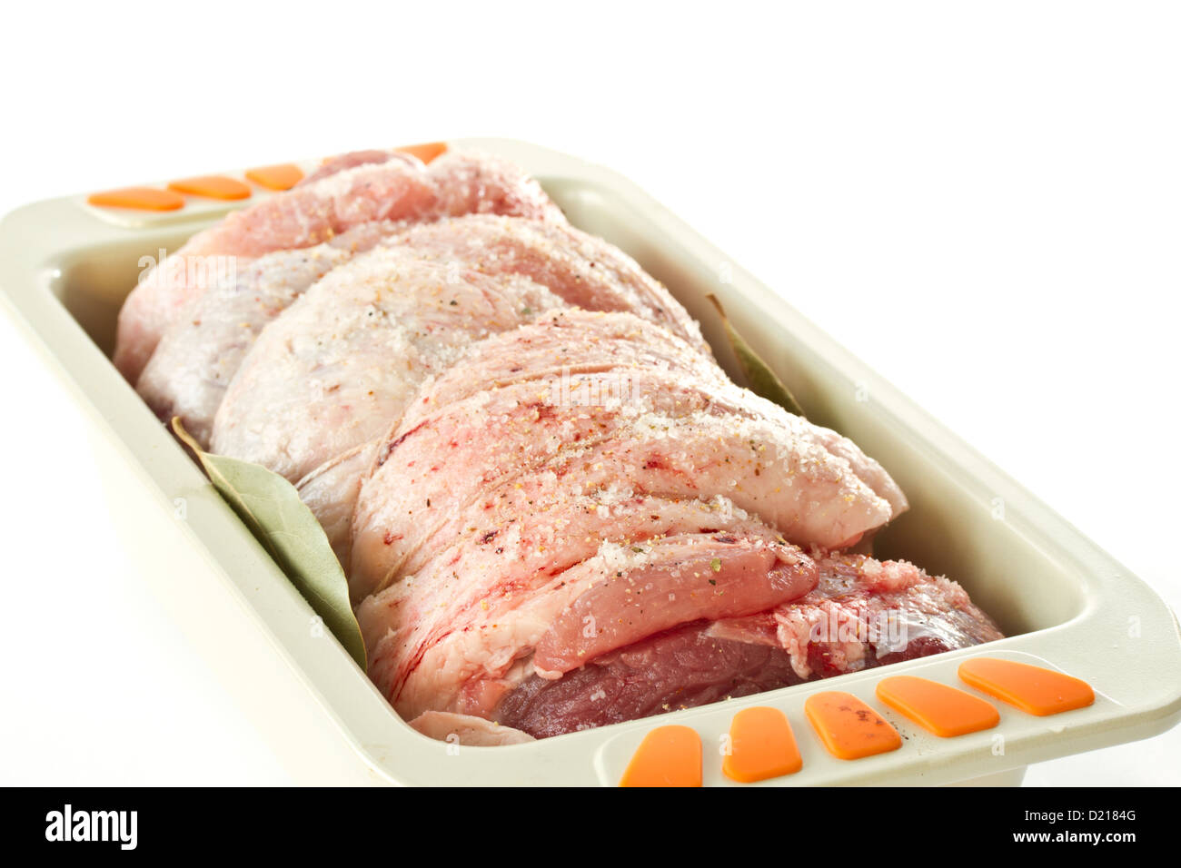 raw meat wrapped in a roll on a white background Stock Photo - Alamy