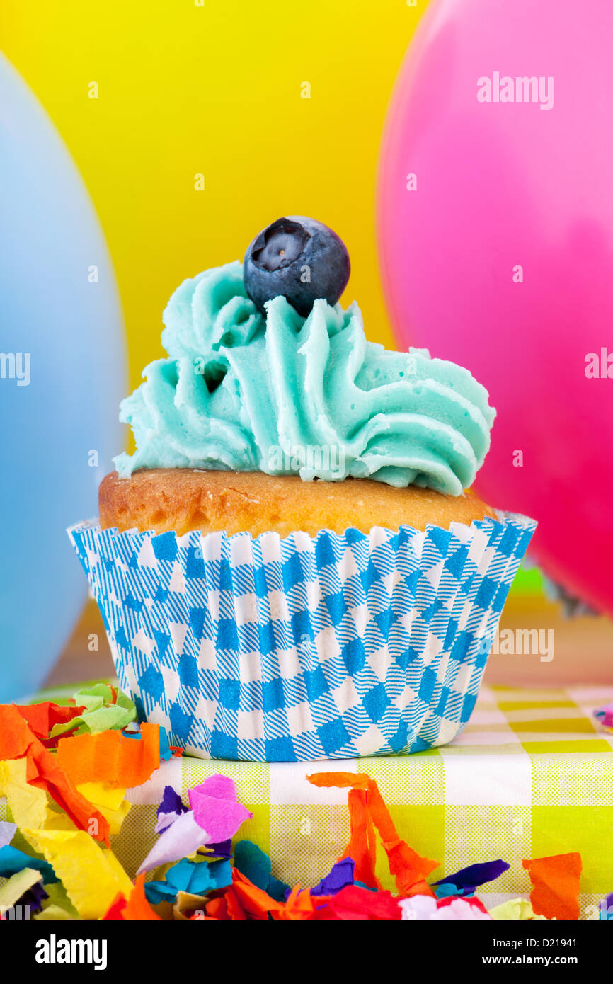 colorful birthday cupcake with confetti and balloons Stock Photo - Alamy