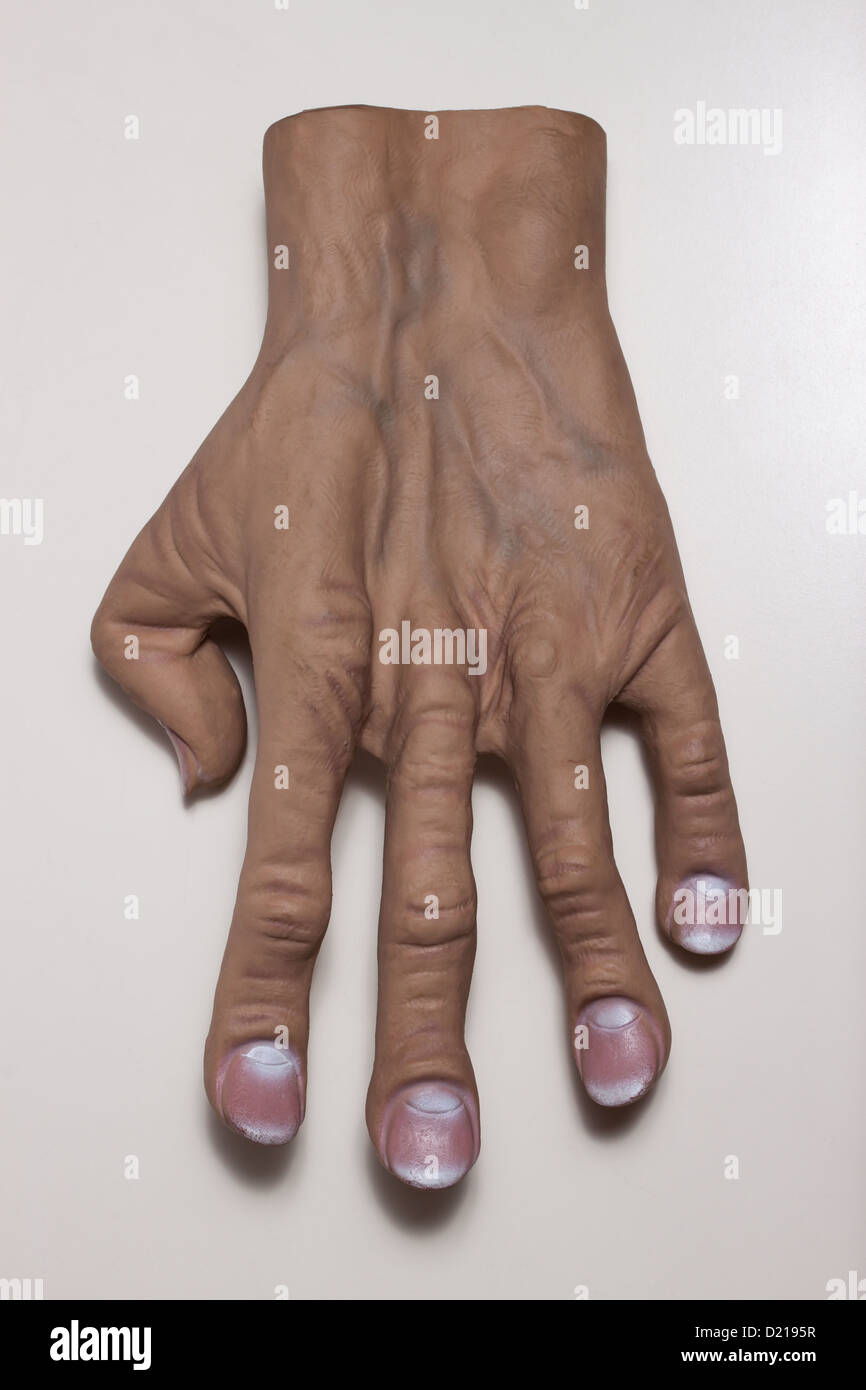 top view of a huge fake hand on white surface Stock Photo - Alamy
