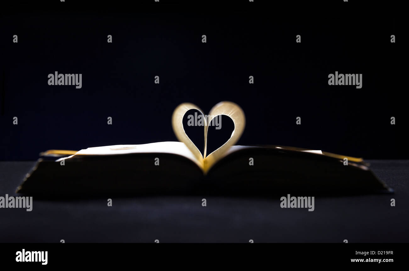 Bible pages heart hi-res stock photography and images - Alamy