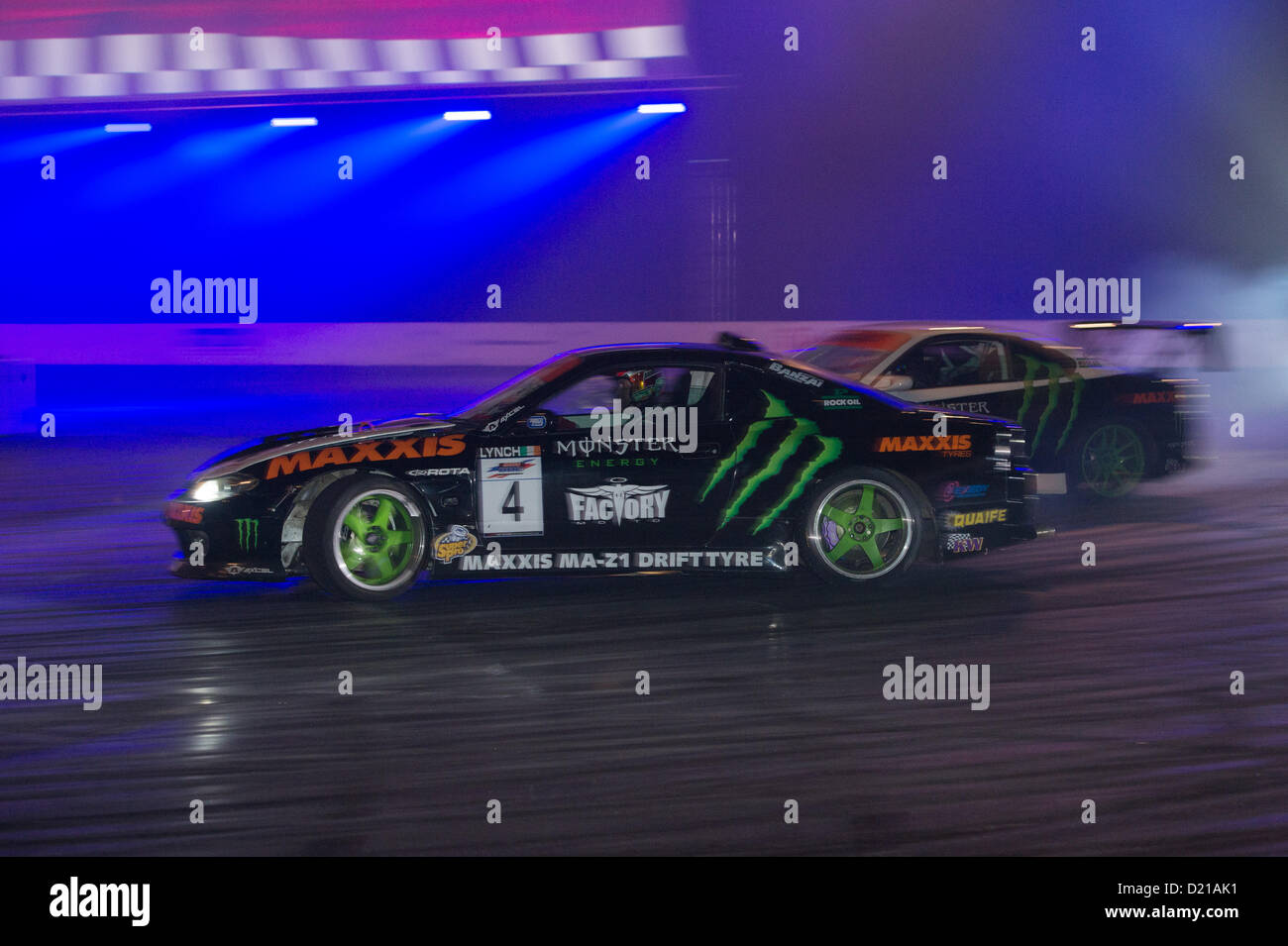 Shane Lynch, former singer in the band Boyzone, driving a drifter car ...