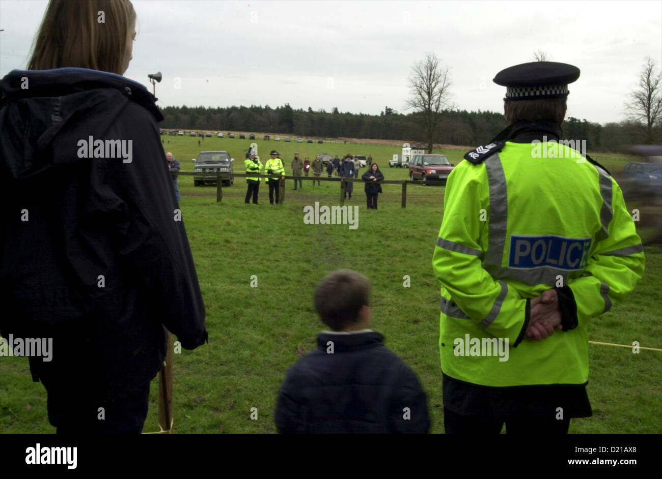 A Policeman with public at a Point to Point Horserace Stock Photo - Alamy