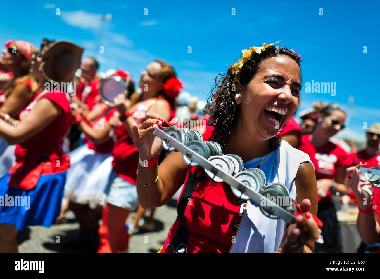 A chocalho player of the Empolga as 9 band performs during the carnival ...