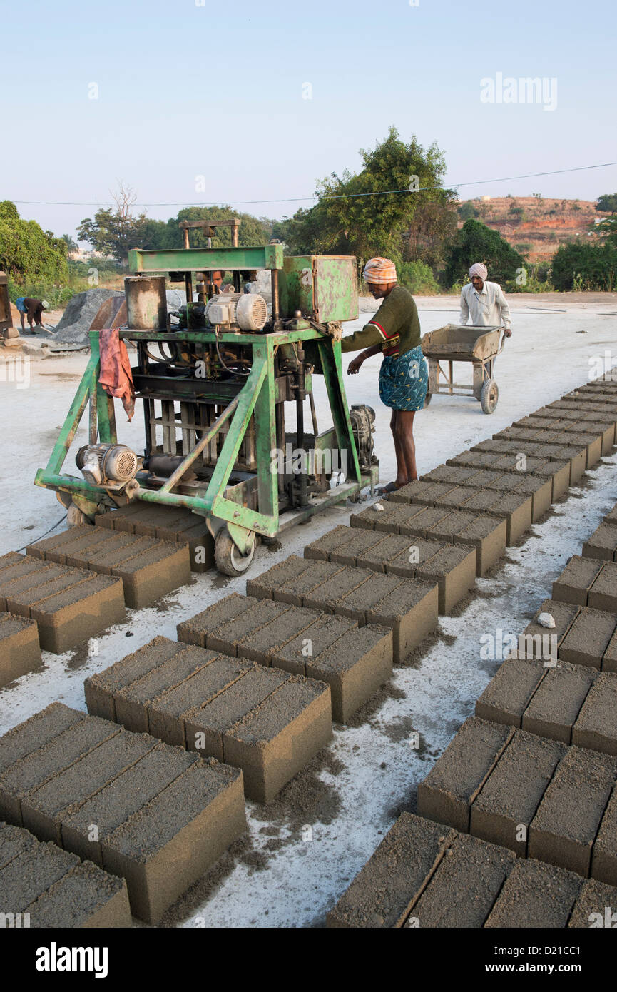 Indian people making concrete blocks. Andhra Pradesh, India Stock Photo ...