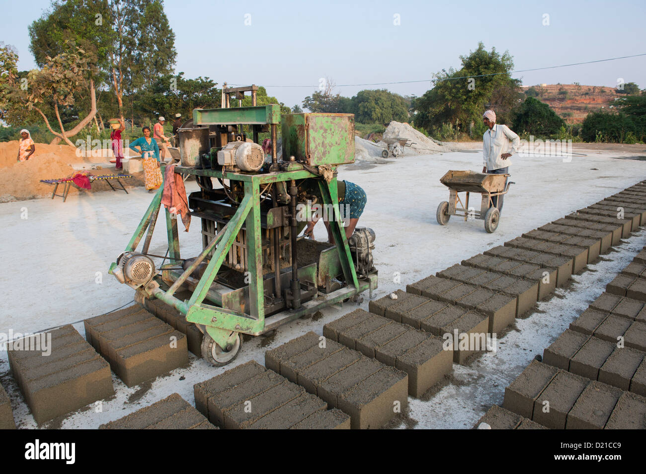 Indian people making concrete blocks. Andhra Pradesh, India Stock Photo ...