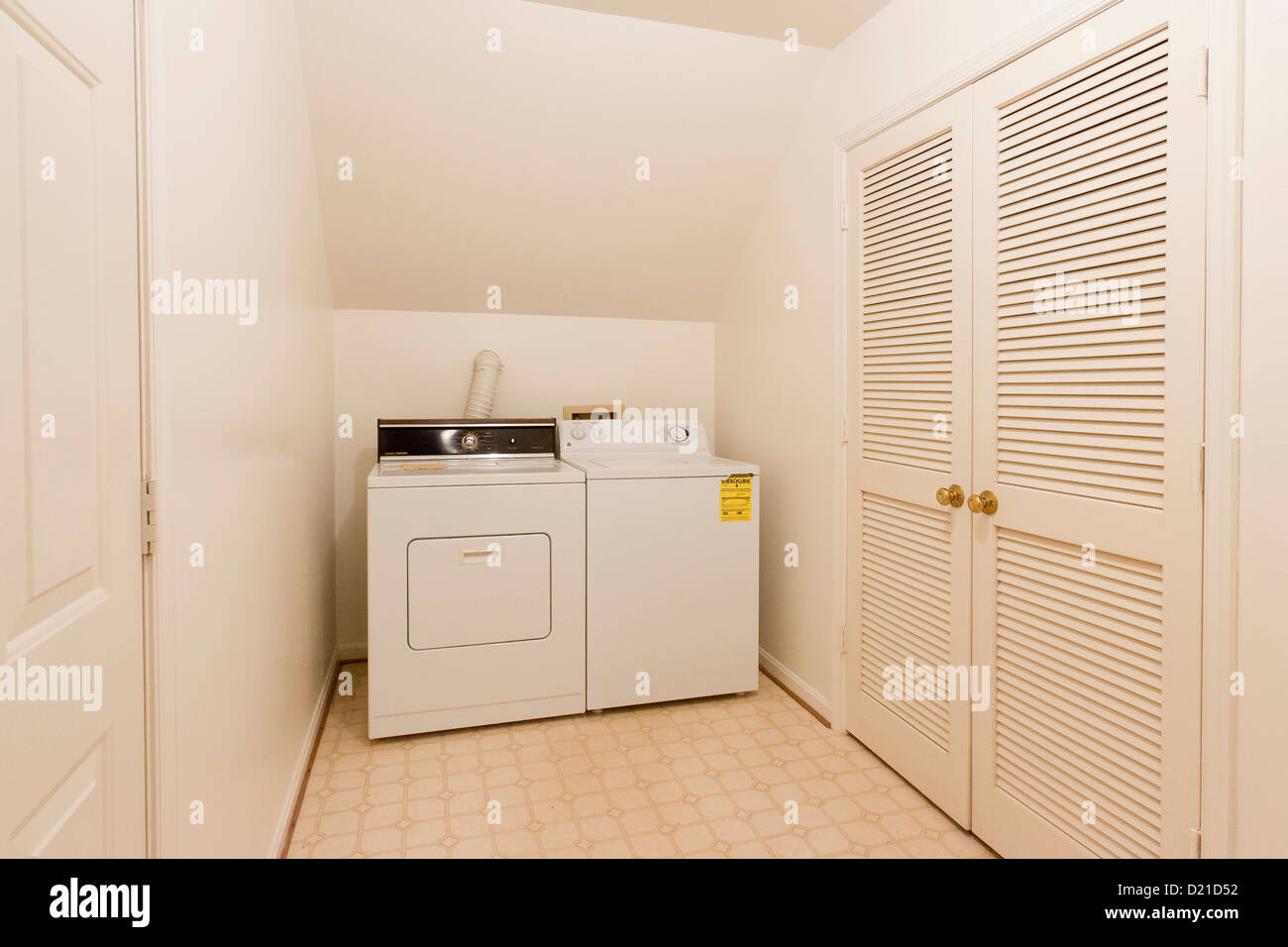 Empty laundry room Stock Photo - Alamy