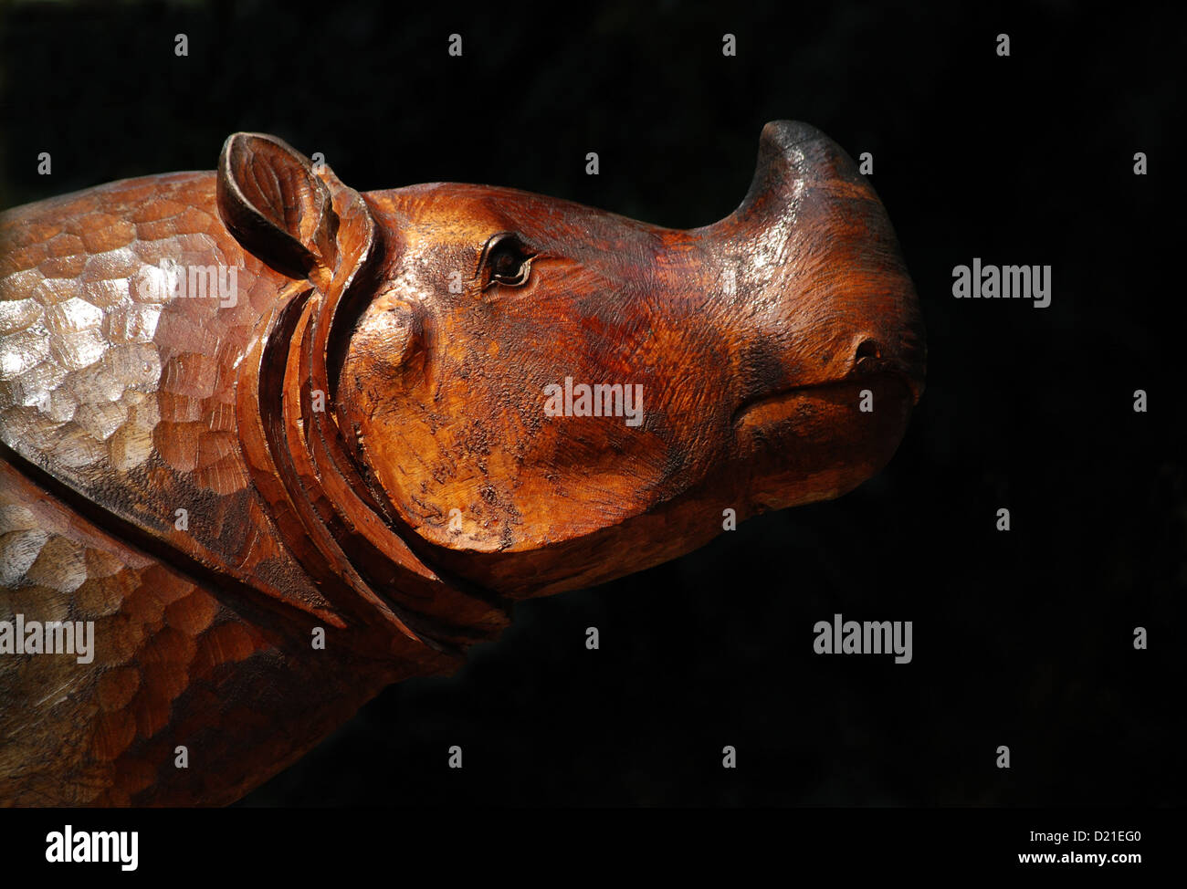 wood sculpture of hippopotamus Stock Photo - Alamy