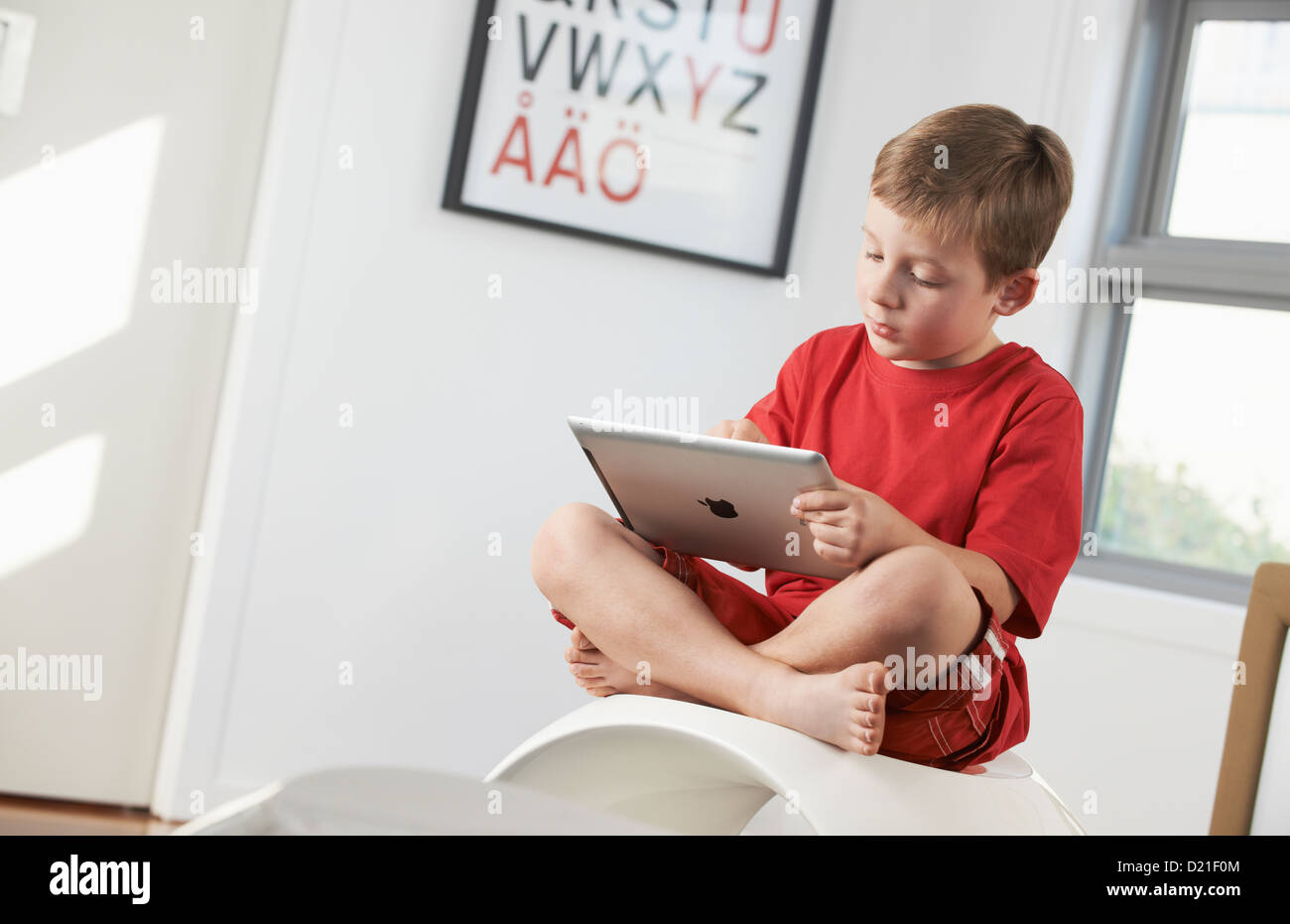 Boys Using Ipads High Resolution Stock Photography and Images - Alamy