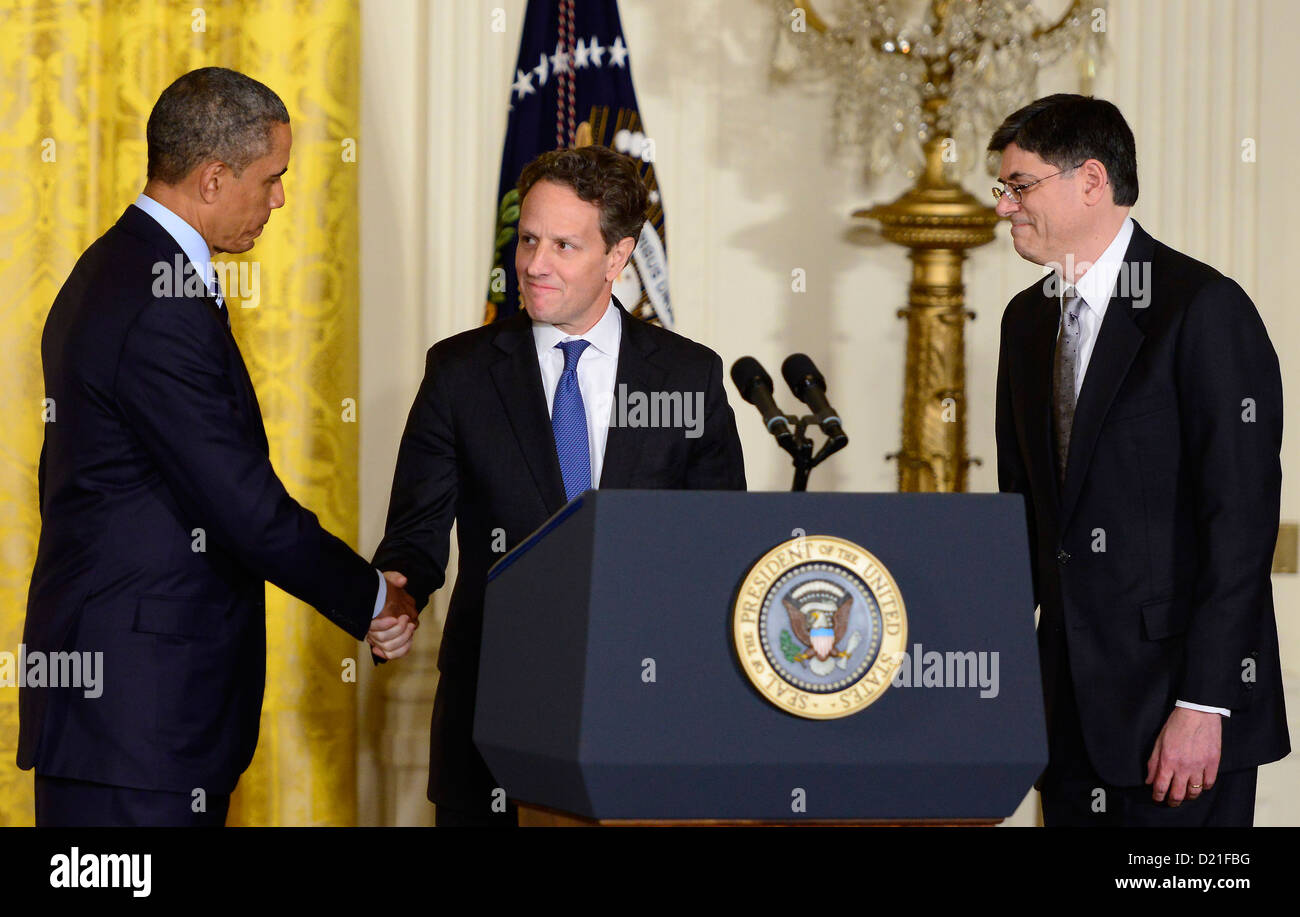 United States President Barack Obama, left, shakes hands with Secretary ...