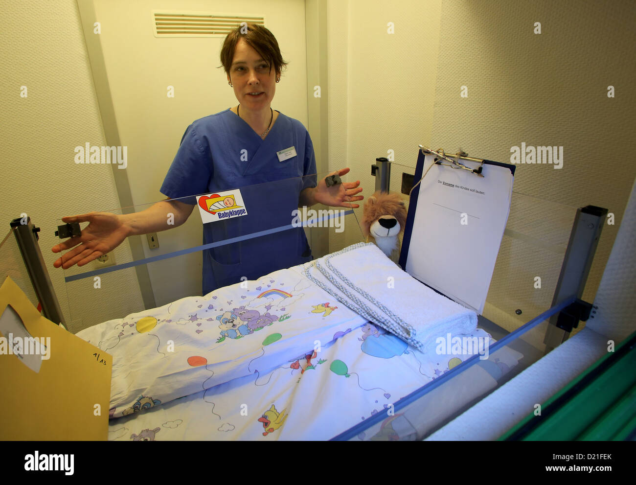 A prepared baby crip for the infant stands at the baby hatch of Helios ...